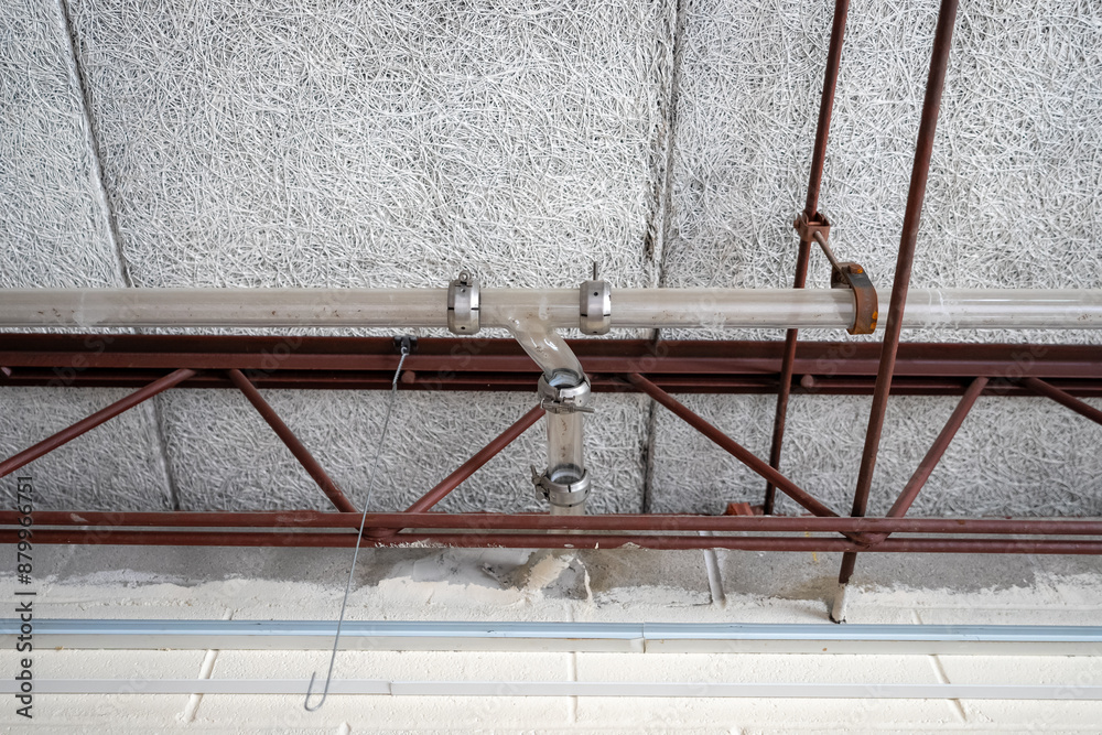 Old ceiling mounted glass drain, vent, pipes in school science room or ...