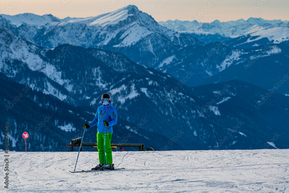 Skier in the Three Peaks (Drei Zinnen) ski resort in the UNESCO World ...