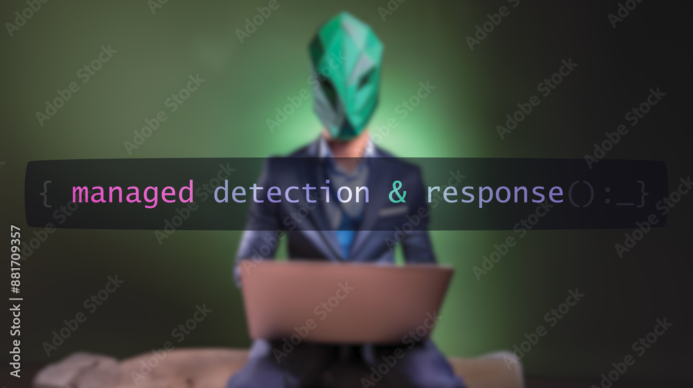 Cybersecurity concept managed detection and response on foreground screen, hacker silhouette ...