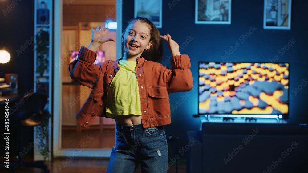 Kid influencer having fun dancing in home studio, recording video for ...