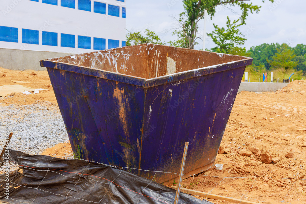 During construction house, garbage metal containers are used for ...