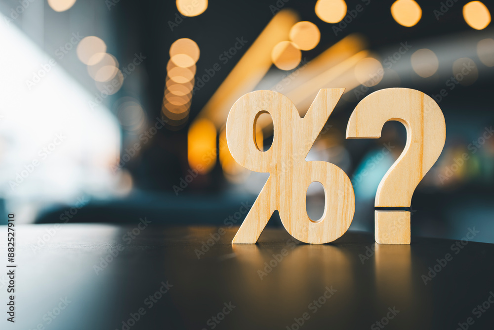 Percentage and question mark on wood table in blur urban background ...