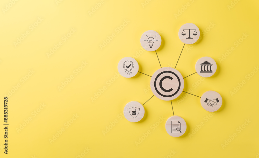 Digital Copyright and Patent Concept. Wooden blocks with various icons ...