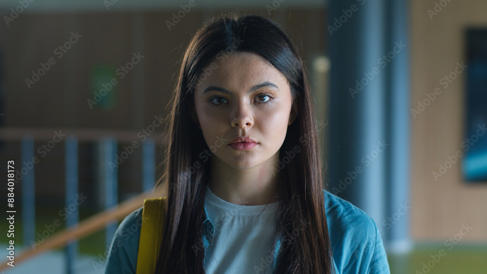 Portrait serious calm sad upset Caucasian student girl female ...