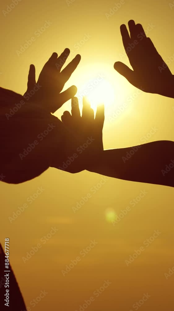 Group of happy children raise their hands to sun. Boy girl party ...