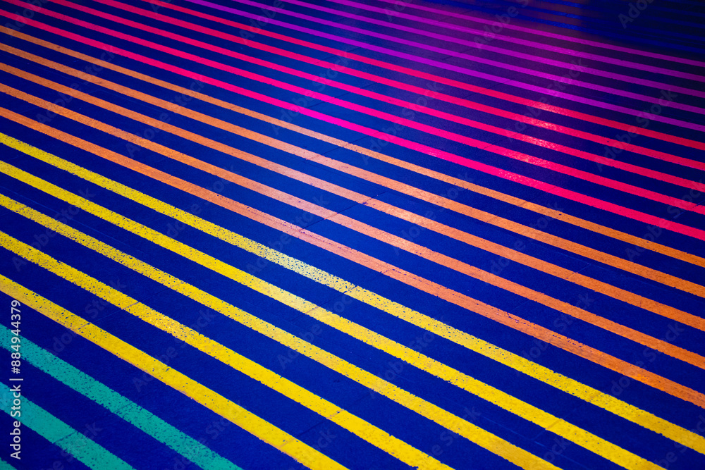 Colorful lines on the blue floor and walkway. Crossing the street on a ...