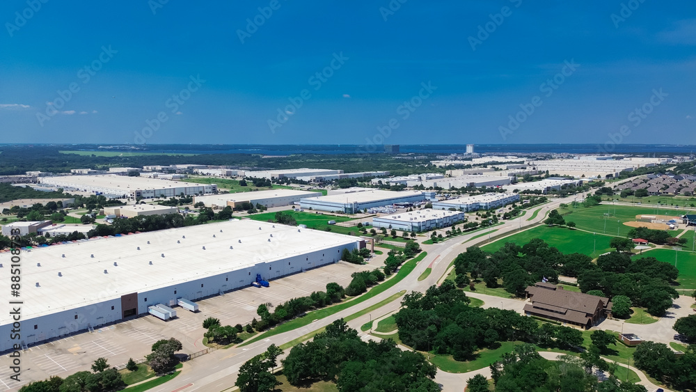 Industrial zone on suburb with basketball field park, suburban houses ...