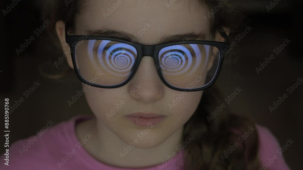 Child Girl With Glasses Watching Hypnotic Screen. Influence of Media on ...