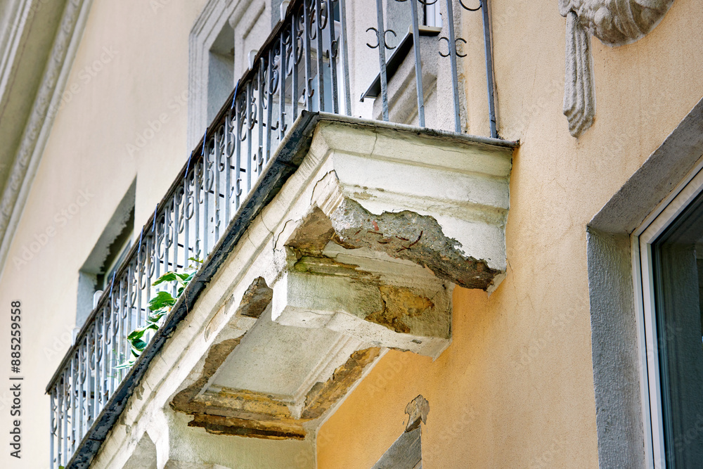 Broken balcony of an old historic building. Damaged balcony floor ...