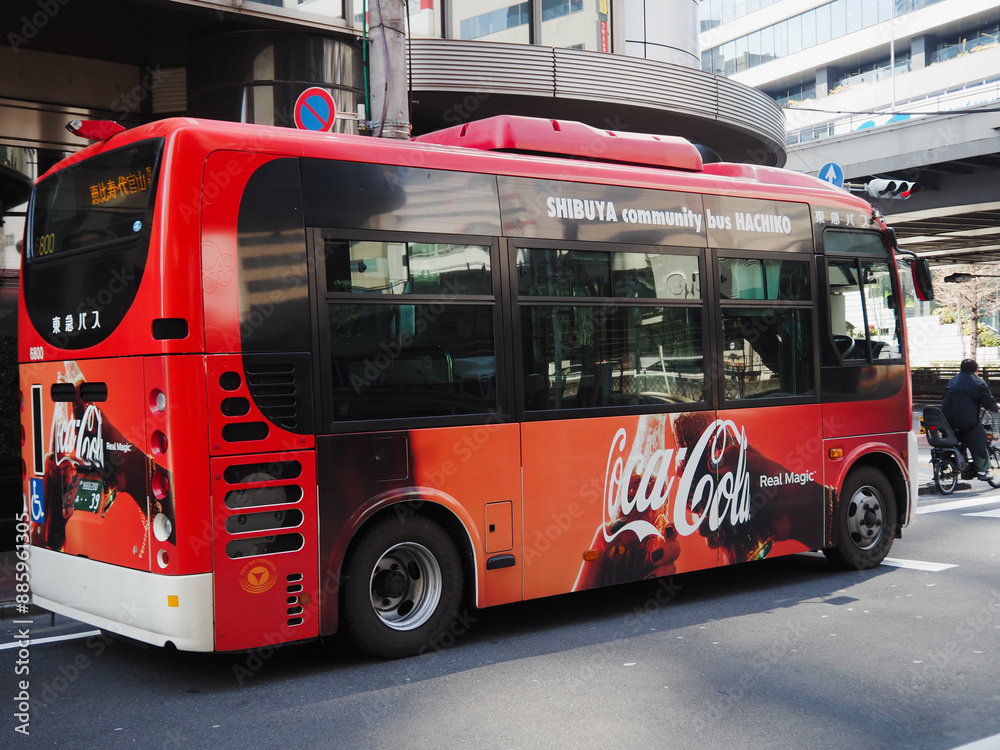 TOKYO, JAPAN - March 15, 2024: A Shibuya 'Hachiko Bus' bus featuring a ...
