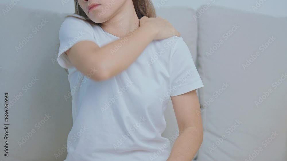 Woman having Shoulder and Neck pain at home. Muscle painful due to ...
