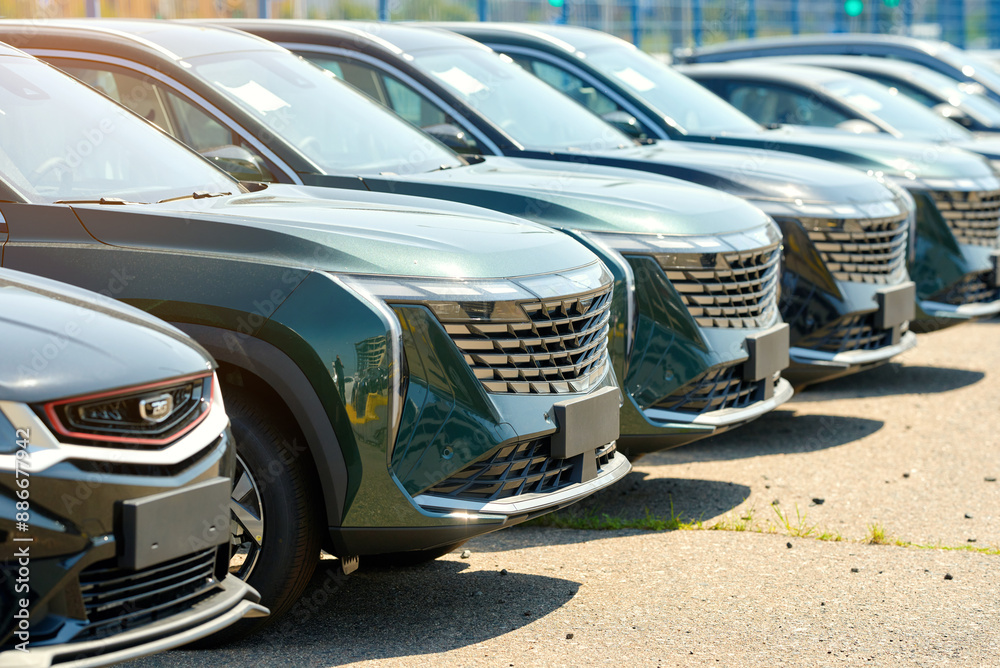Minsk, Belarus. Jul 16, 2024. Geely Atlas new cars parked in row at ...