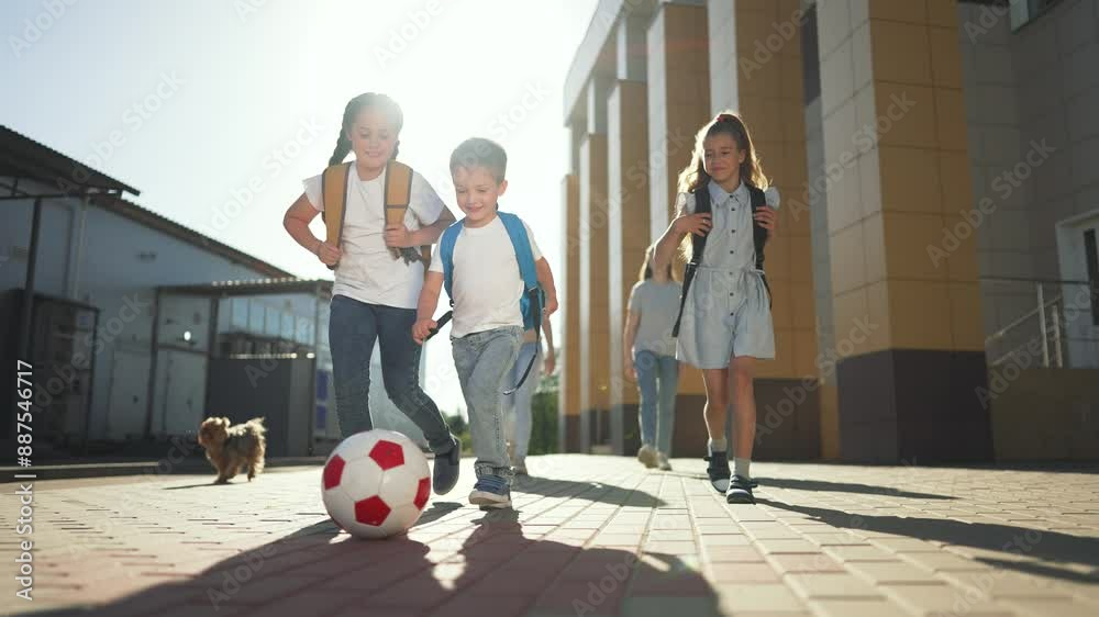 Happy children playing with ball. Kids learning teamwork. Group of ...