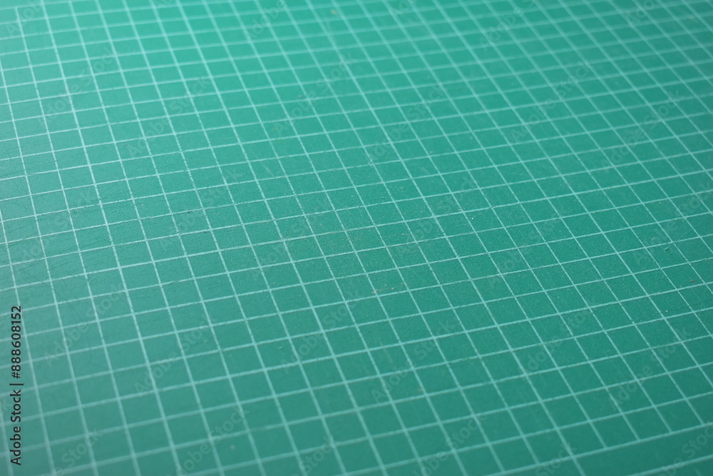 green cutting mat board background with line and scale measure guide ...