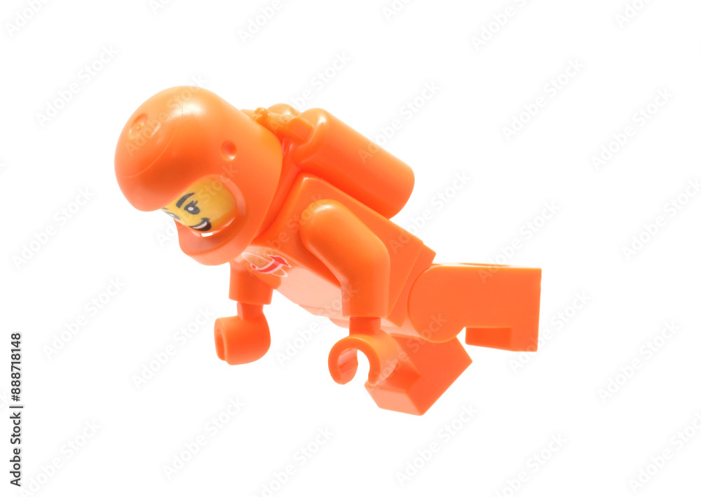 Lego minifigure of astronaut woman in orange space suit by zero gravity ...