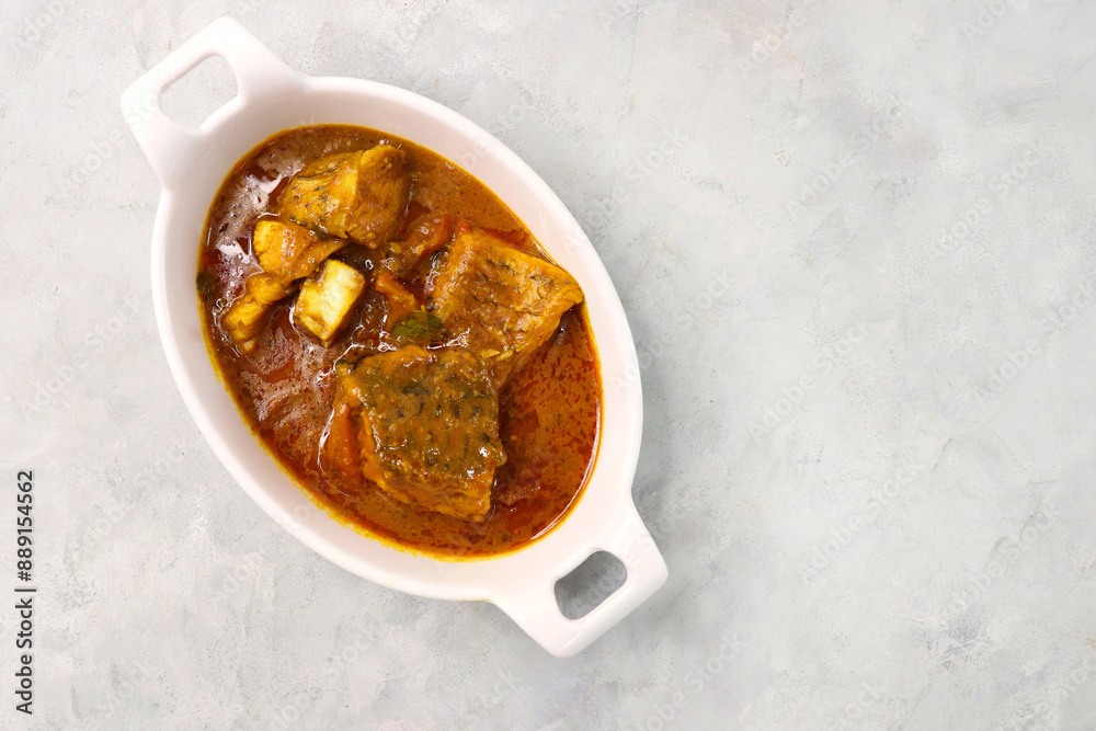 Indian Food. Homemade Spicy and tangy dadha or threadfin fish curry ...
