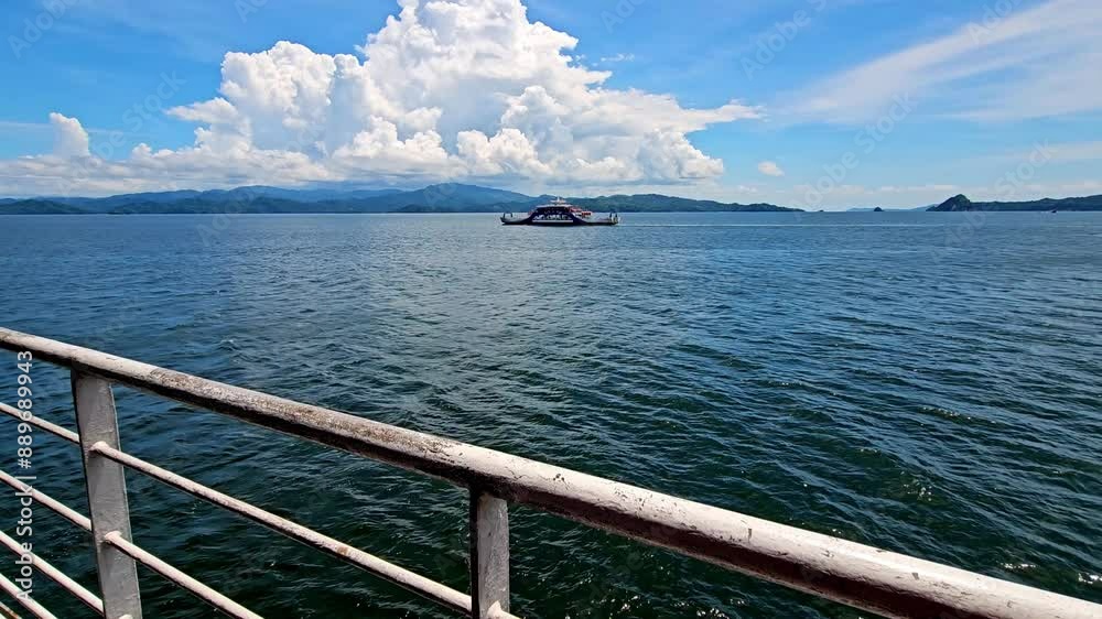 Boat crossing the Gulf of Nicoya in one of the ferries leaving from ...
