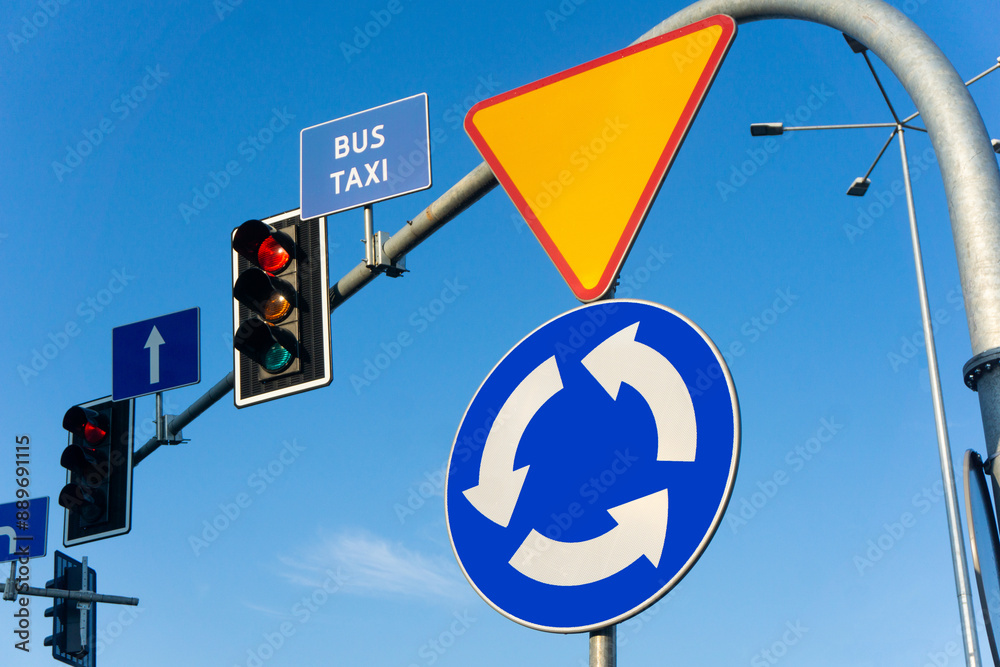 Complex traffic light setup at an intersection. Multiple signals ...