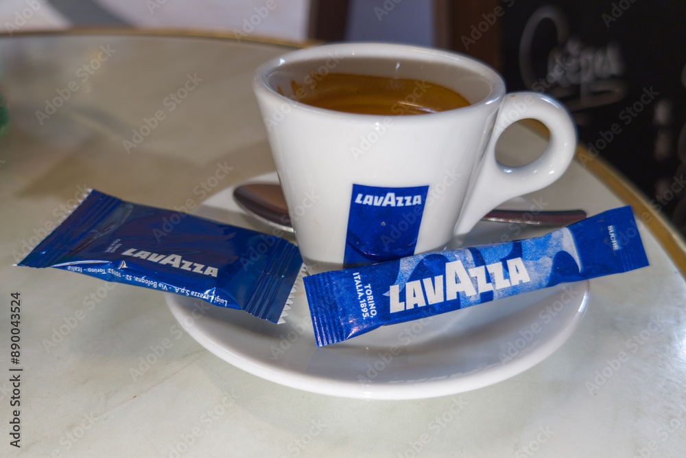Lavazza logo brand and sign text on coffee cup blend and sugar Stock ...