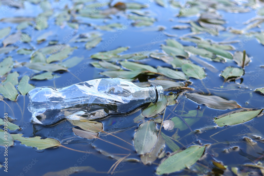 Plastic bottle in water, lake or river. Plastic pollution. Pollution of ...