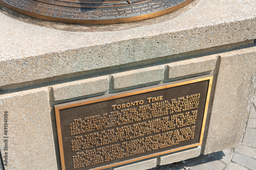 Toronto Time equatorial sundial plaque with inscription located on the ...