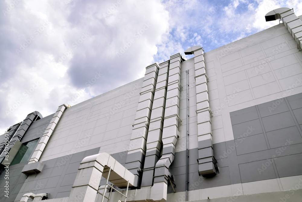 group of grey aluminum ventilation tube on outside building, air ...