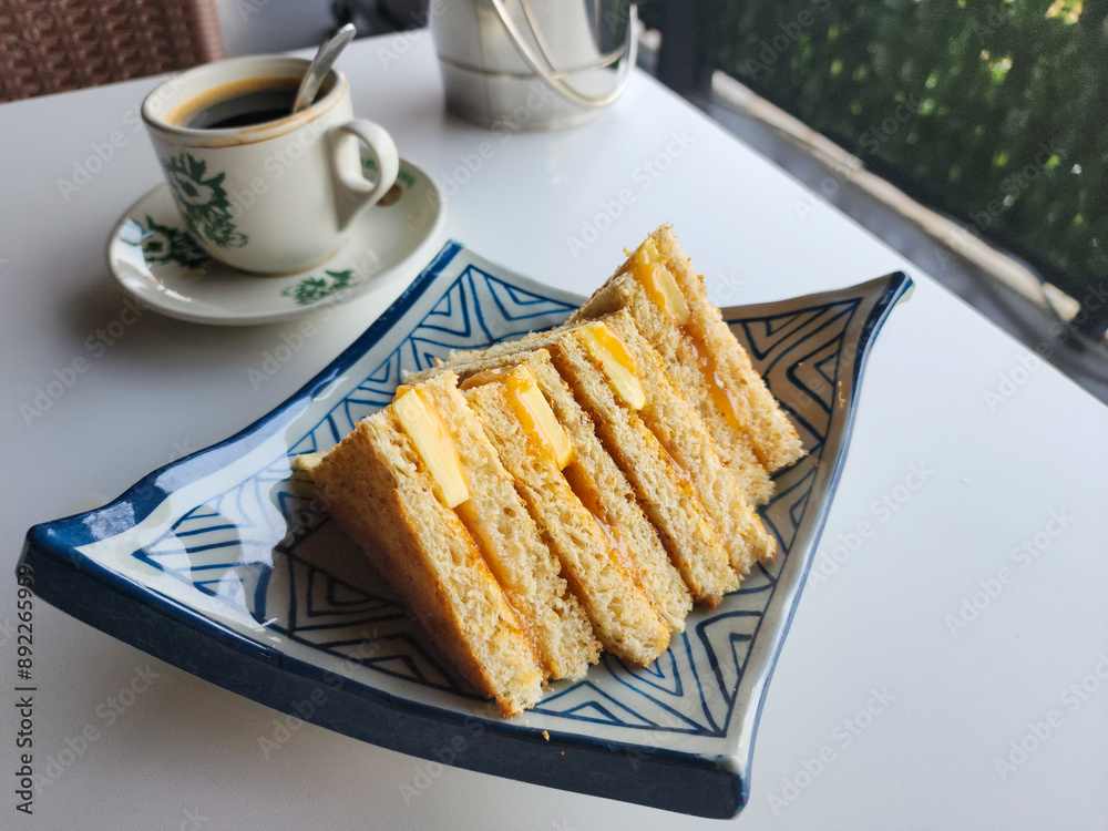 Kaya toasts butter and black coffee is a traditional oriental and ...