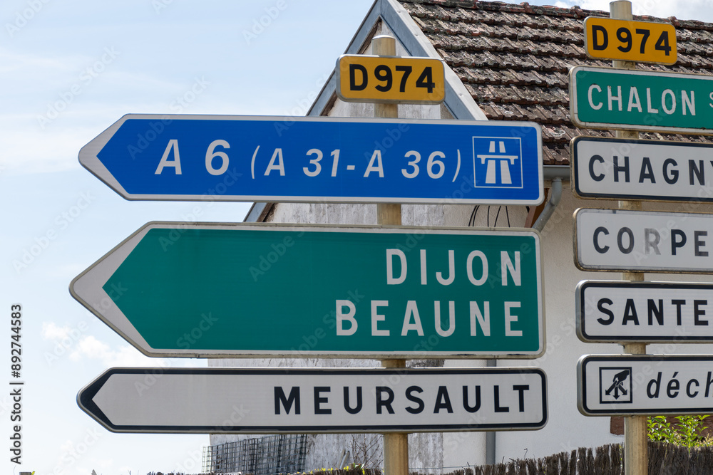 Driving in summer on road, signs direction to Dijon, Beaune and other ...