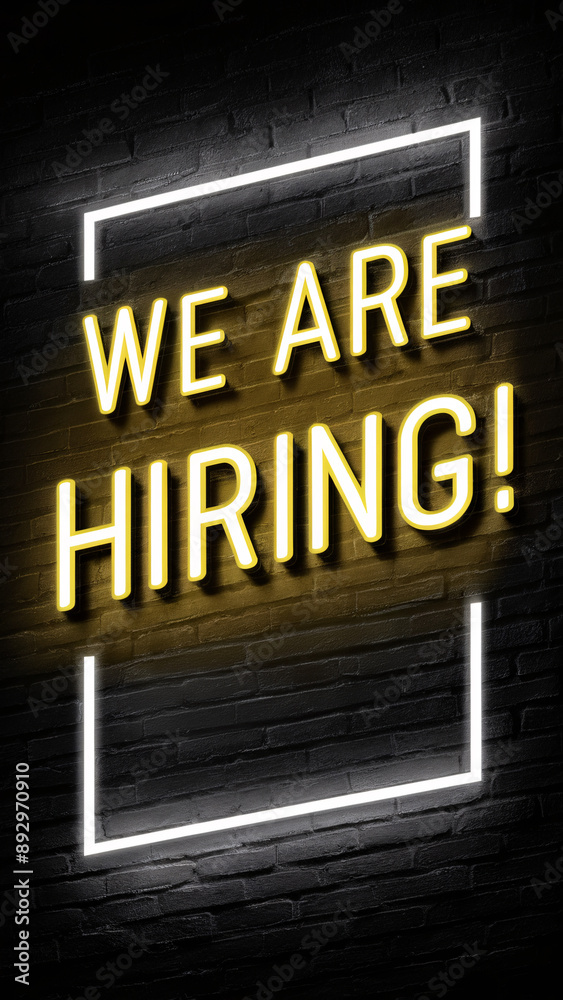 Yellow Neon "We Are Hiring" Sign on Black Brick Wall with Additional ...
