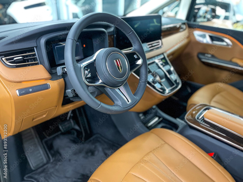 Interior of a car detail SUV Hongqi HQ9 luxury. Hongqi HQ9 logo on ...