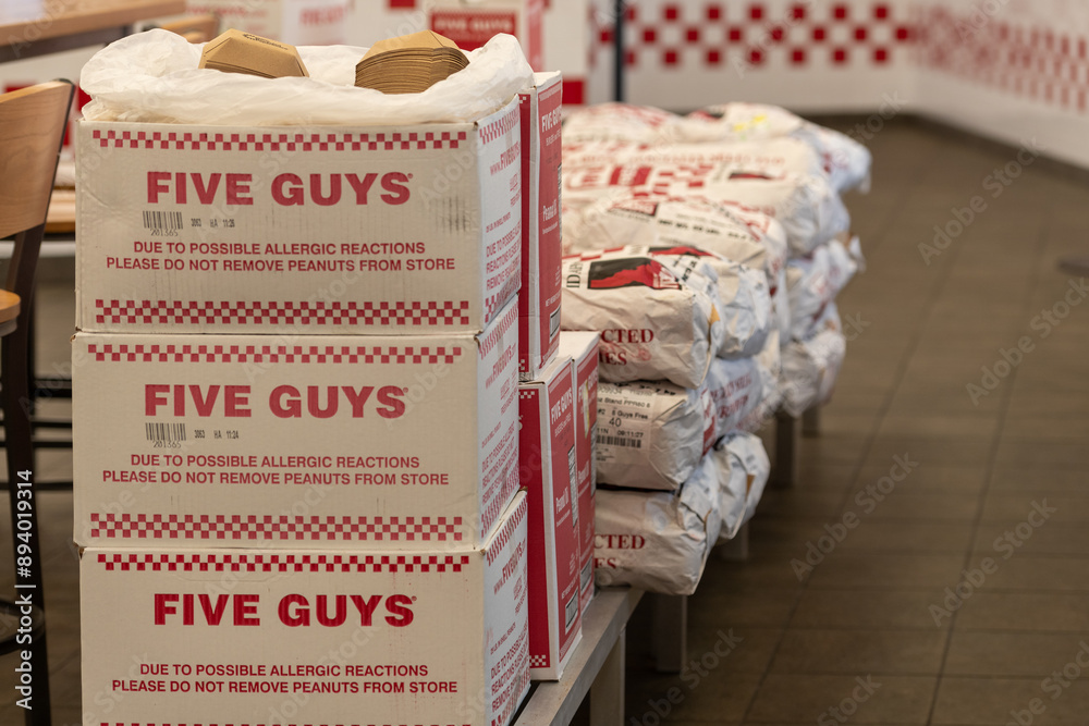 Orlando, Florida, US - July 1, 2024: Boxes and bags of Five Guys salted ...