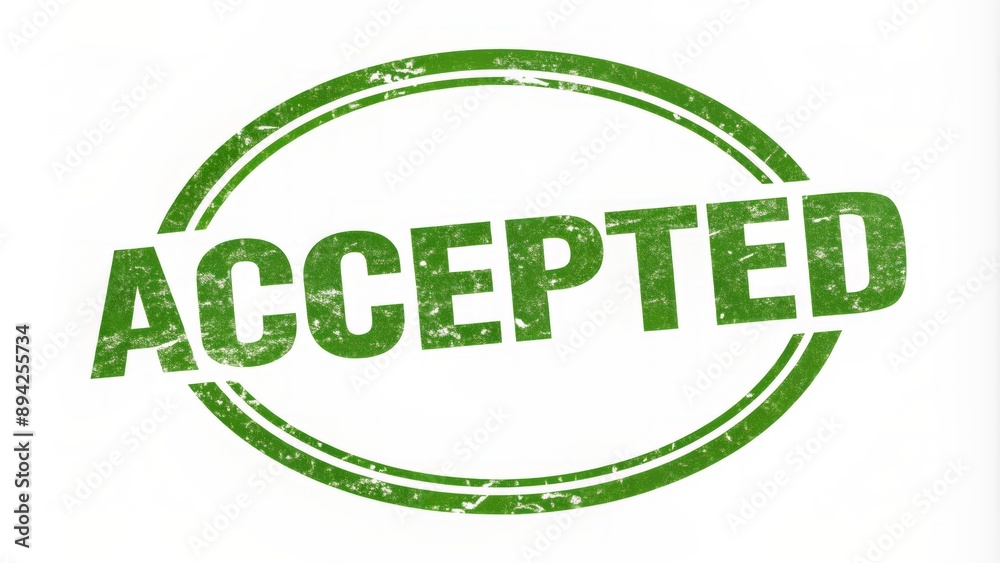 Green circular rubber stamp with bold font word accepted on a crisp ...