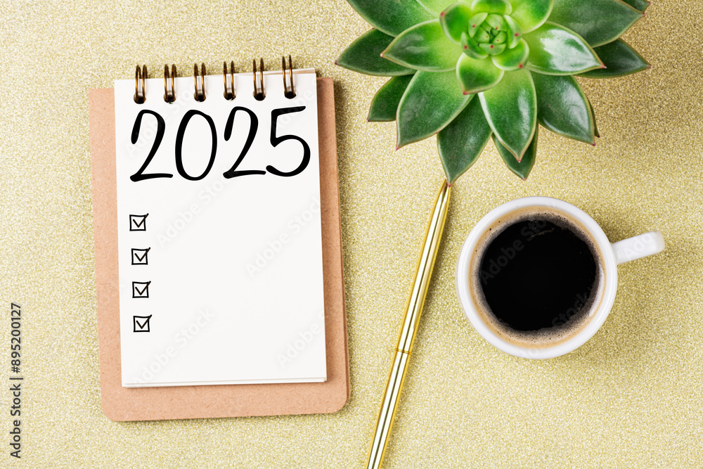 New year resolutions 2025 on desk. 2025 goals list with notebook ...