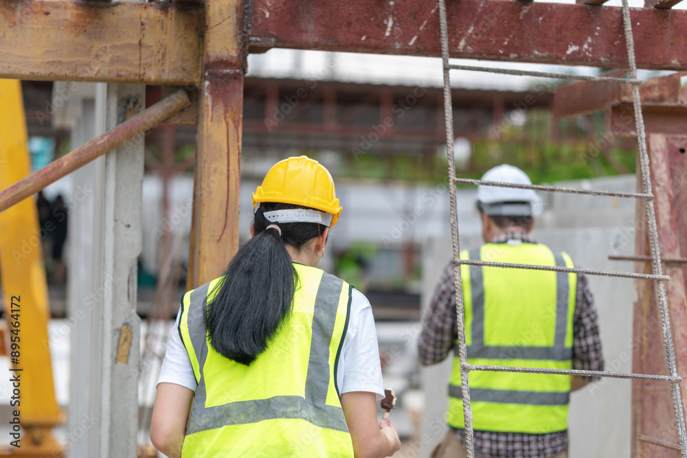 Site manager and builder inspect the construction site, Engineer and ...