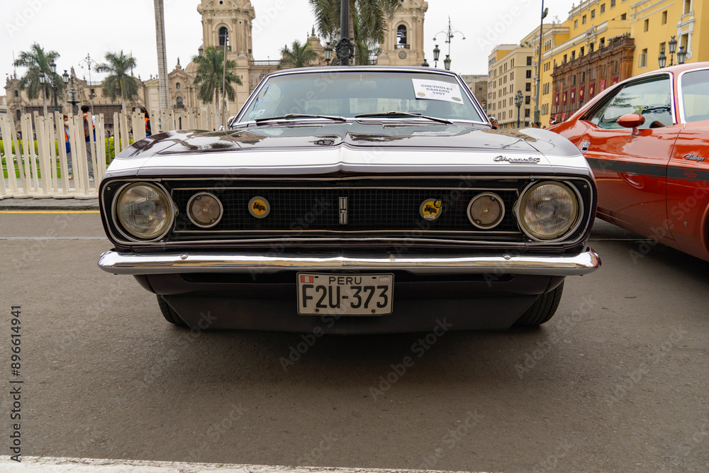 old collector cars on display in the Plaza de Armas of Lima, July 7 ...