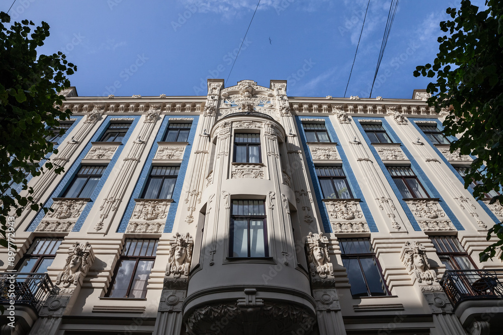 Facade of a typical art-nouveau residential building, also called ...
