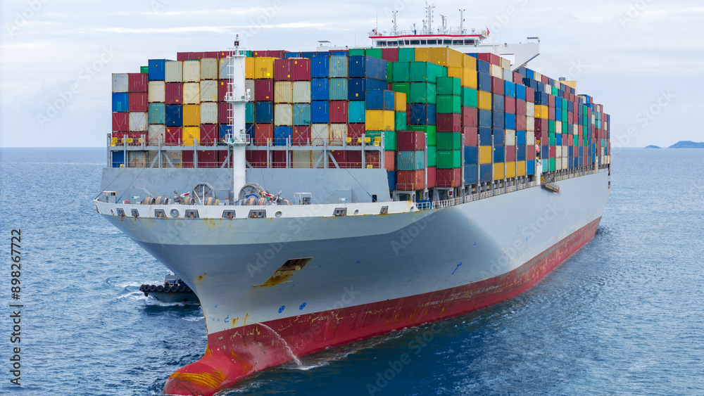 Front of Cargo container ship carrying container and running in ...