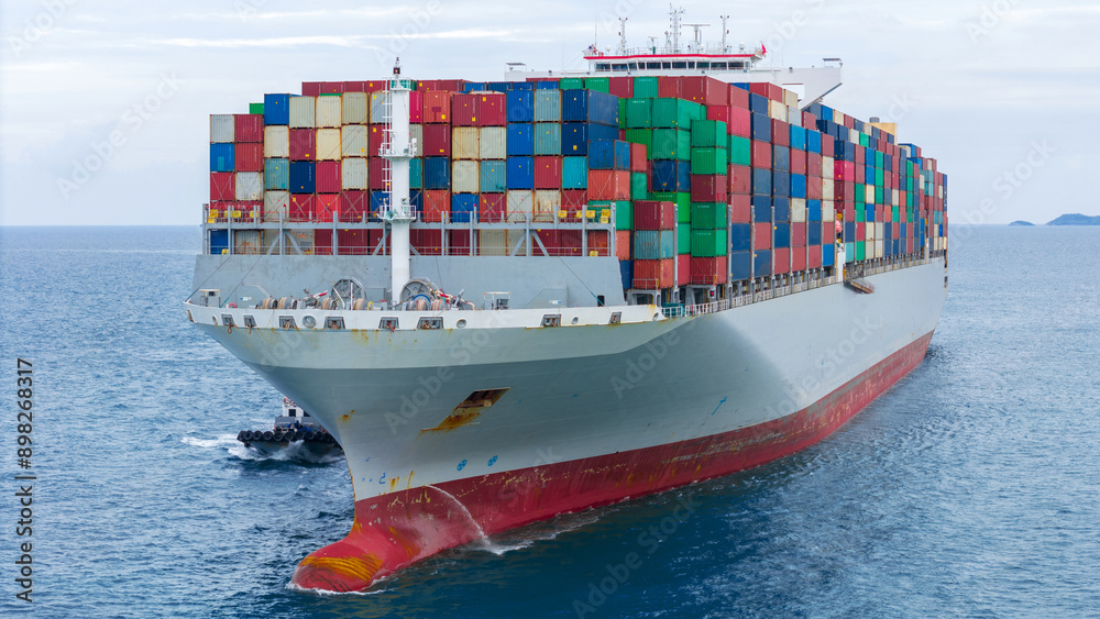 Front of Cargo container ship carrying container and running in ...