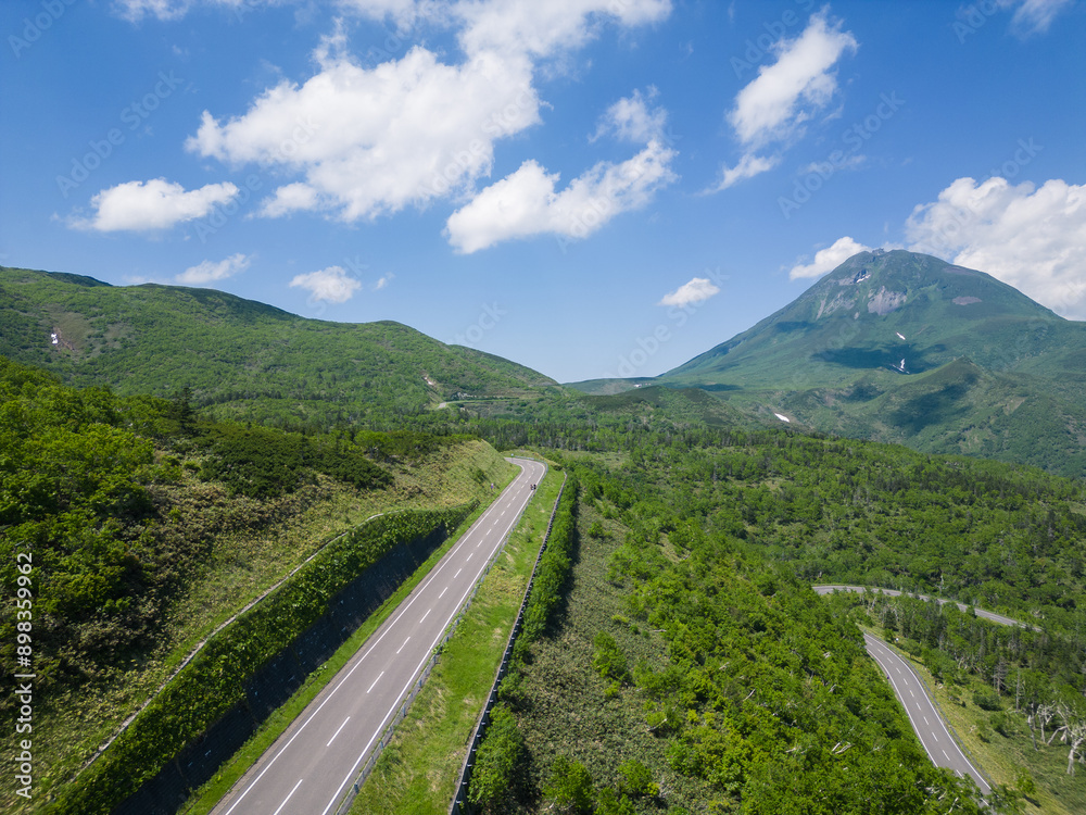 Rausu, Hokkaido: Aerial view of the Shiretoko pass road with the Mt ...