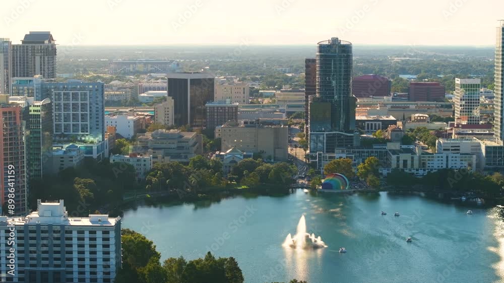 Orlando, Florida city architecture. Lake Eola Park and high-rise office ...