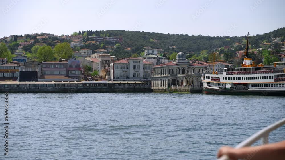 Panoramic ferry view of Buyukada Island, featuring historic buildings ...