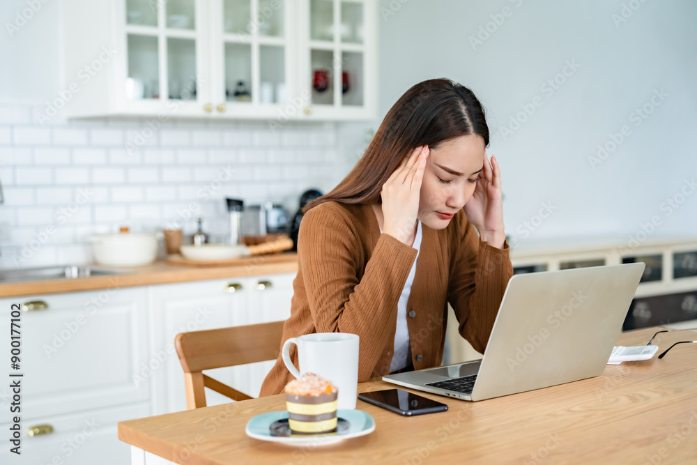 Office syndrome. Overworked tired young asian woman feeling headache ...
