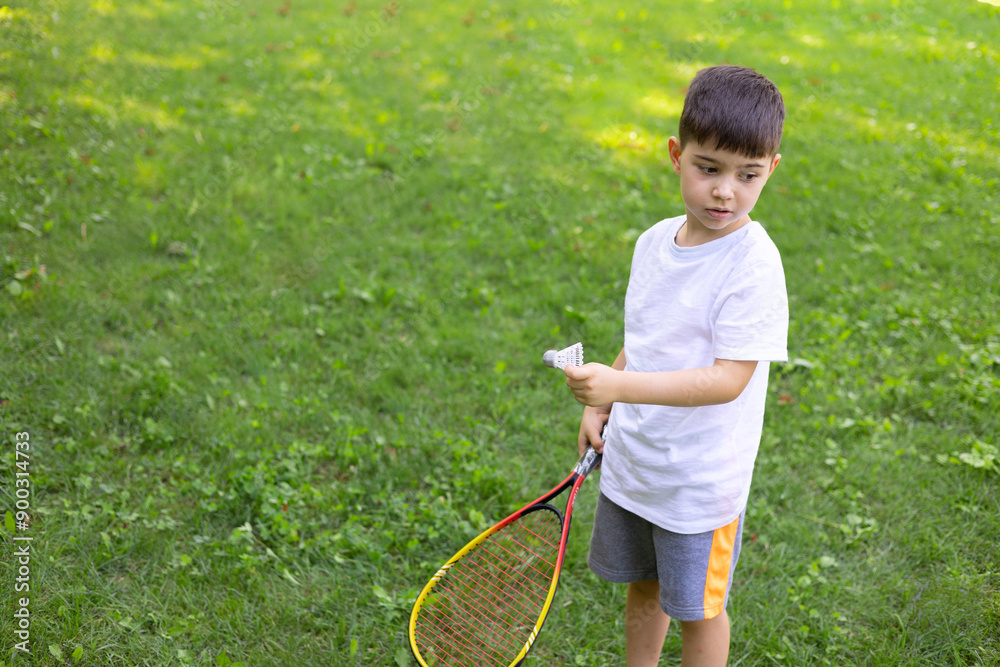 dad and son,kid and man playing outside in park badminton.child boy and ...