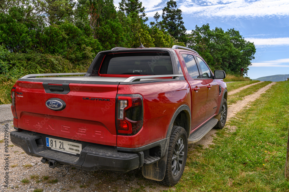 Close-up of the rear bed of a burgundy 2024 Ford Ranger Wildtrak on a ...