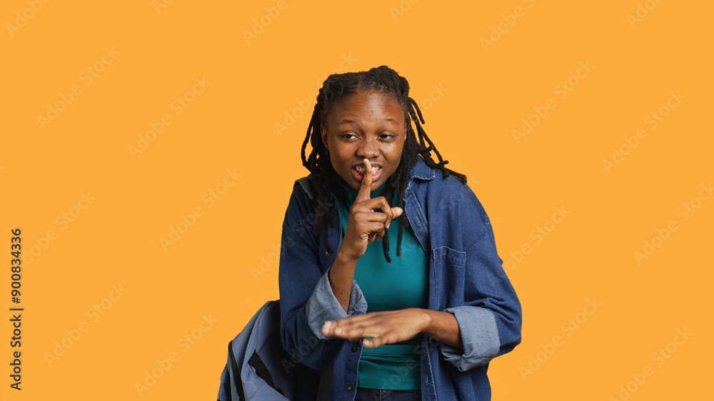 Stern african american woman doing shushing hand gesturing, irritated ...