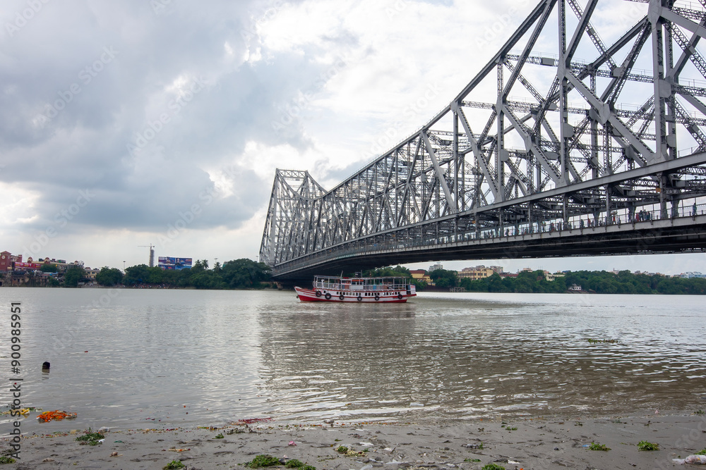 An iconic landmark in Kolkata, the Howrah Bridge is a huge steel bridge ...