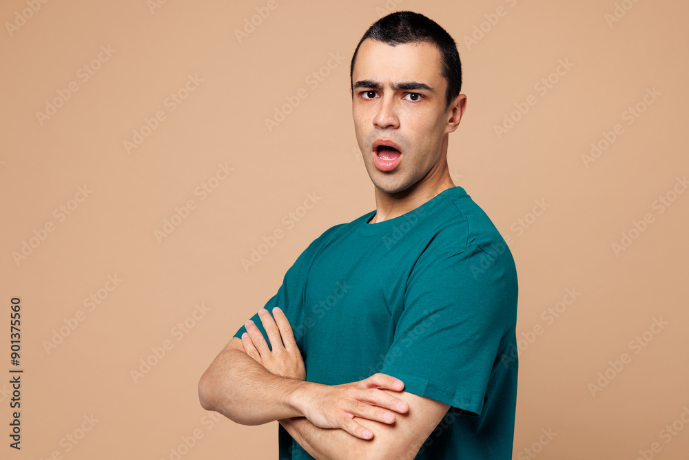 Young sad angry frowning middle eastern man wear blue t-shirt casual ...