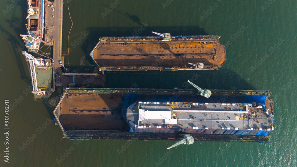 Dry dock with Cargo Ship maintenance or repair at floating dock in ...