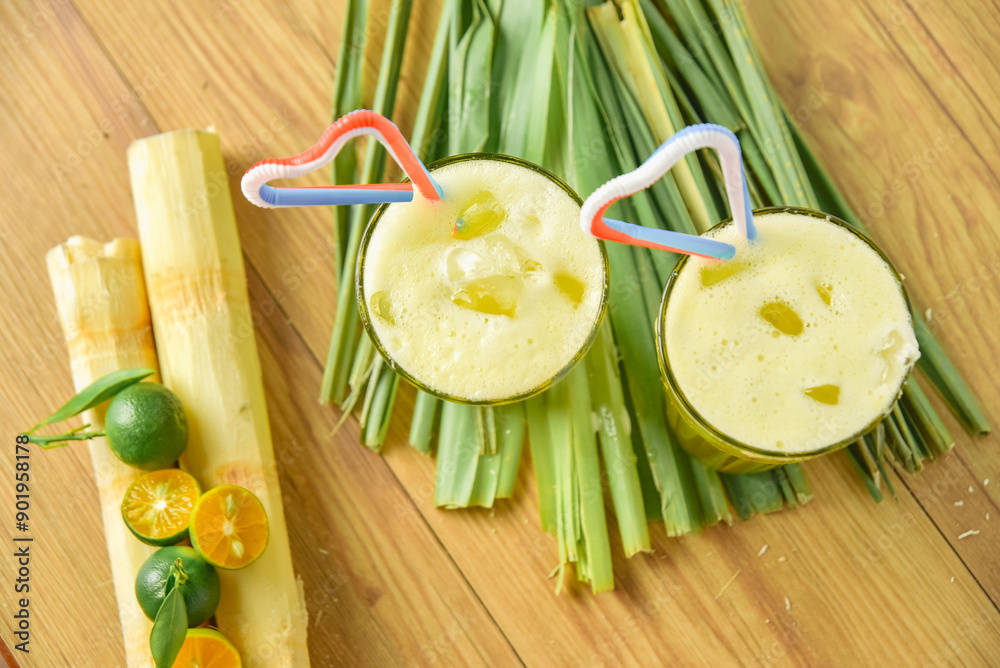 Nuoc mia is Vietnamese sugarcane juice with the real fruit background ...