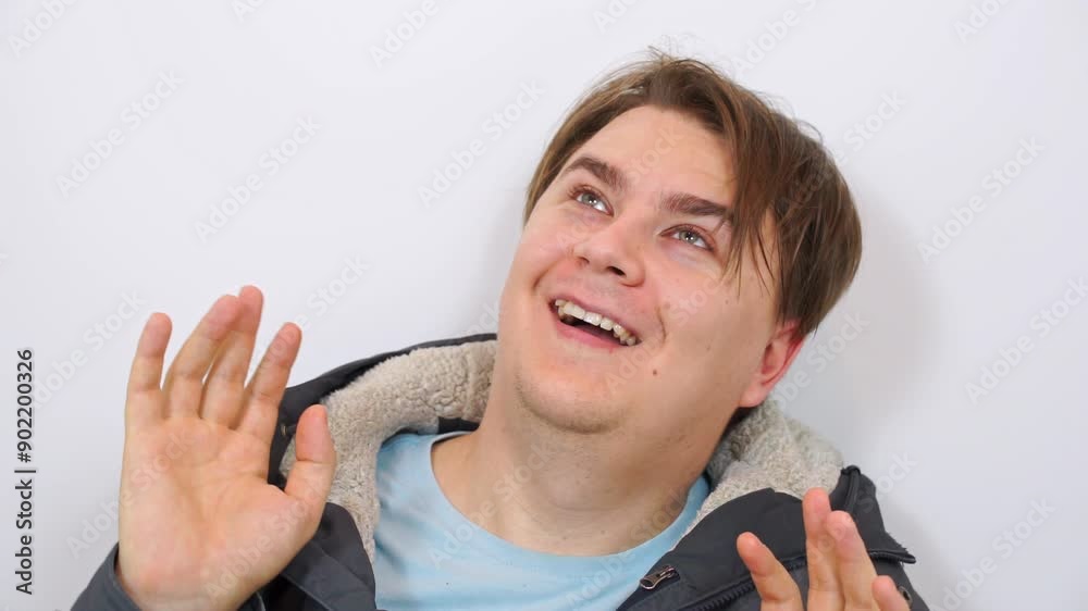 Portrait of crazy strange man with hallucinations, waving arms, turning ...